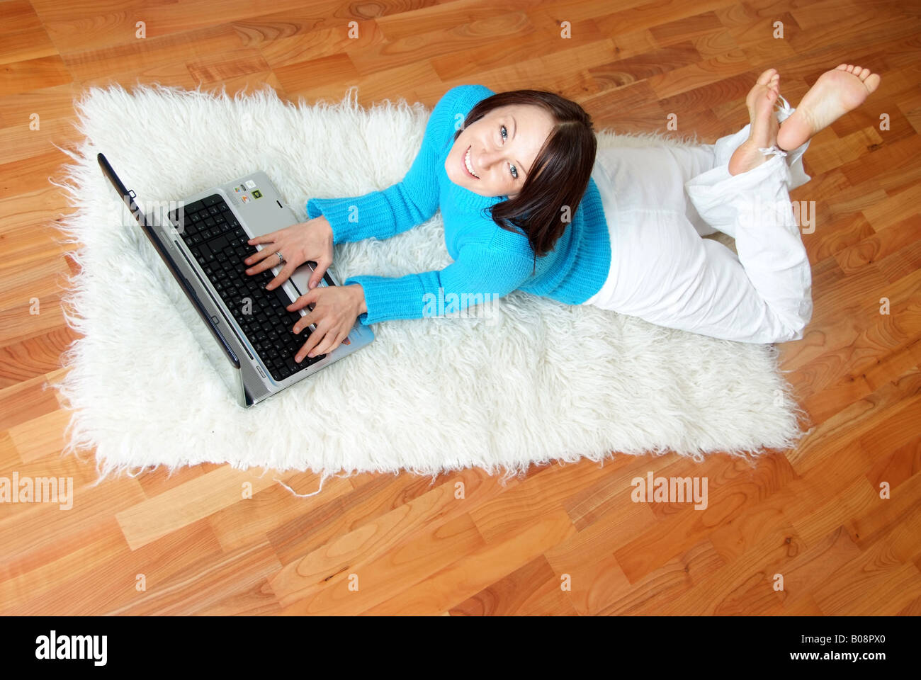 Sheepskin rug woman hi-res stock photography and images - Alamy