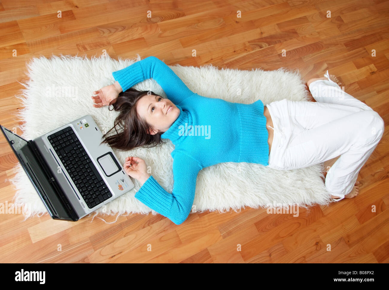 Sheepskin rug woman hi-res stock photography and images - Alamy