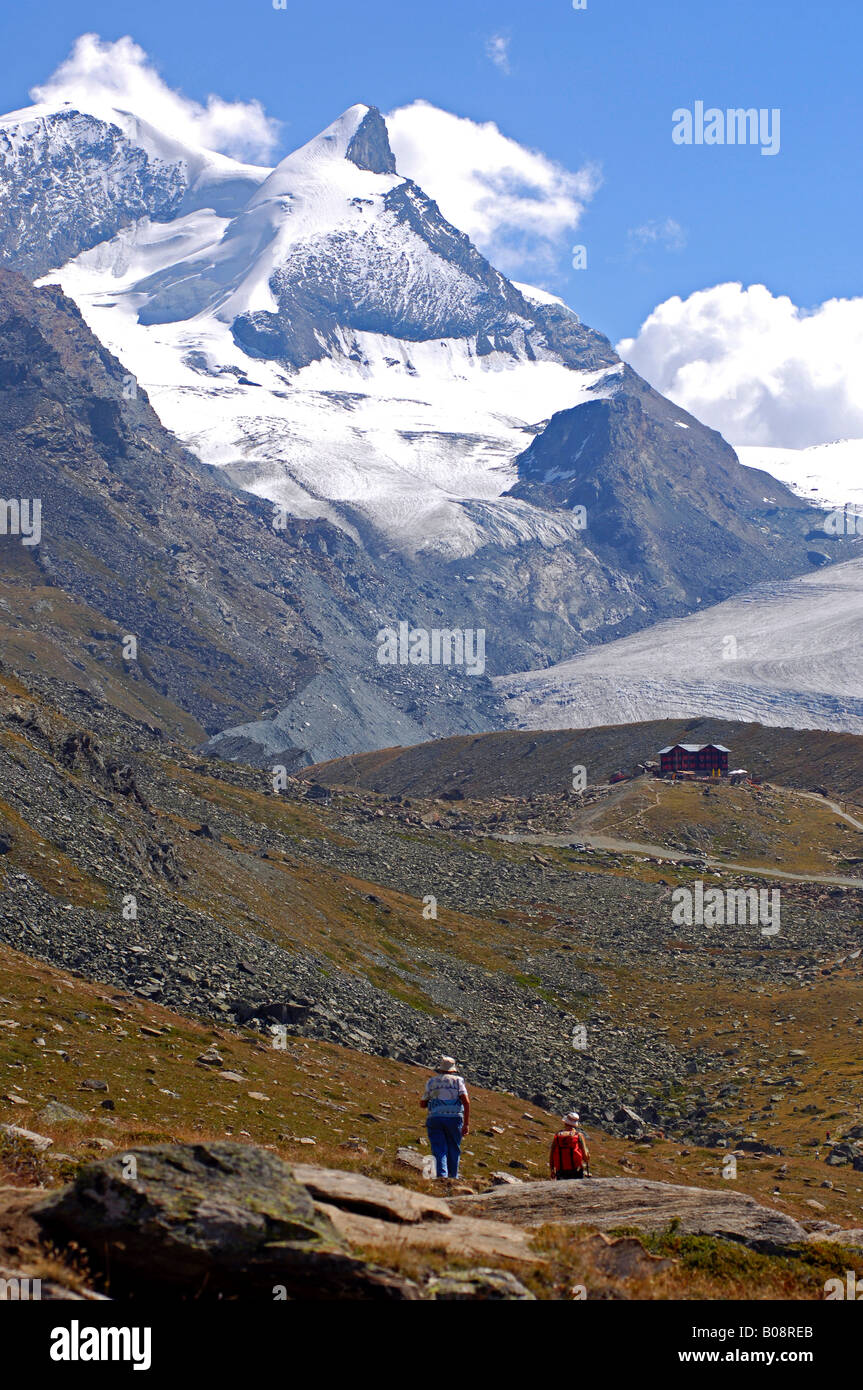 Path to the alpine restaurant Fluhalp, Mt. Adlerhorn (back), Zermatt ...
