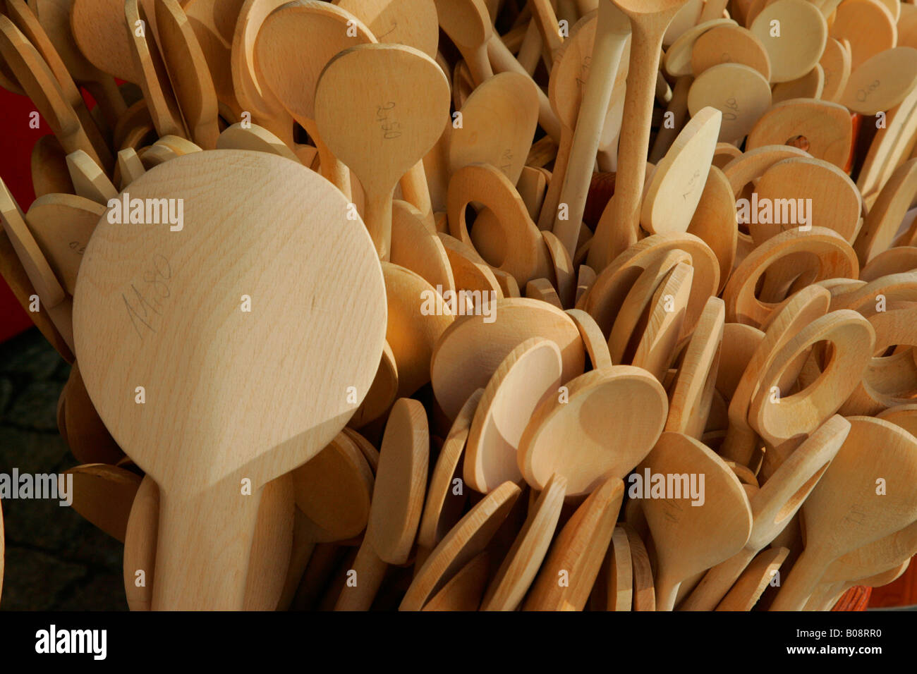 Wooden cooking spoons sold at a market stand, Simonis Market, Muehldorf ...