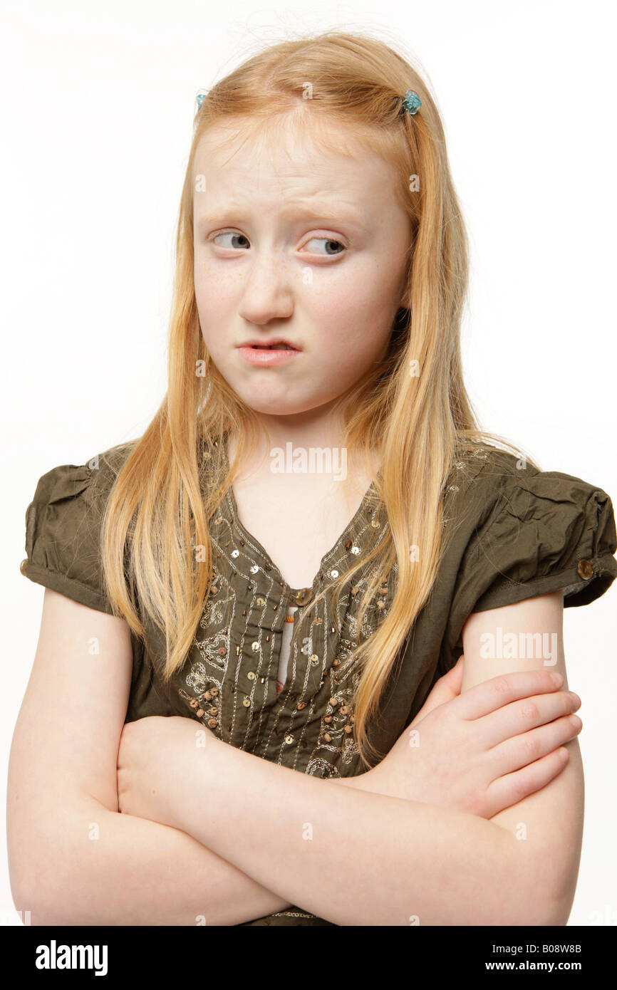 8-year-old redheaded girl making a face Stock Photo - Alamy