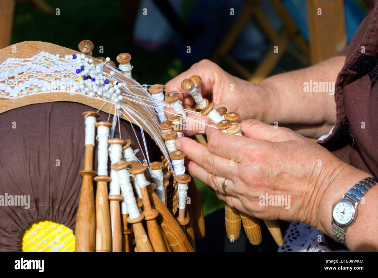 Lace maker, woman's hands at work Stock Photo - Alamy