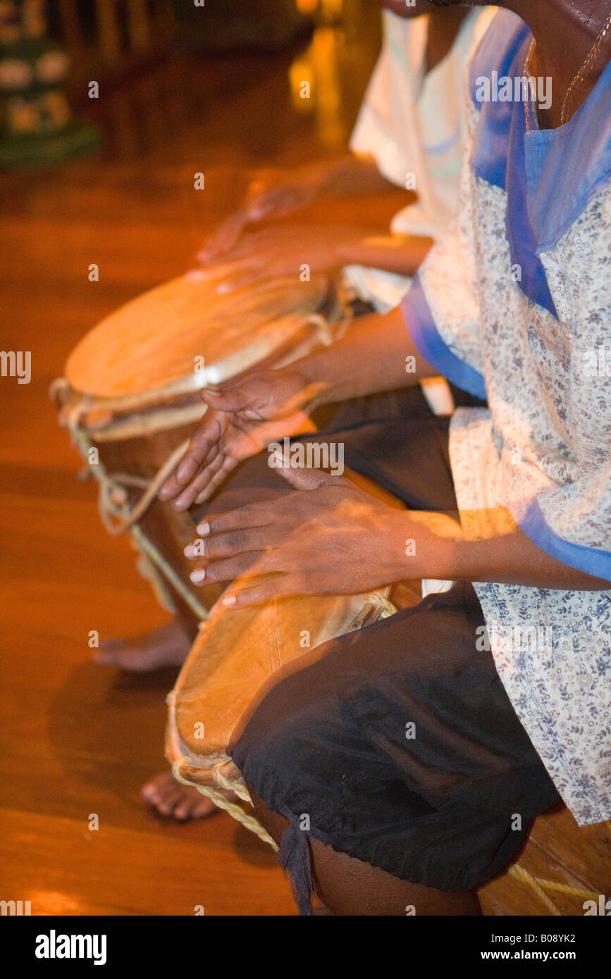 Drummers playing conga drums (lower torso), Placencia, Stann Creek ...