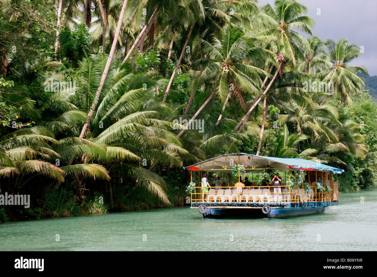 Riverboat, boat navigating the Loboc River, Philippines Stock Photo - Alamy