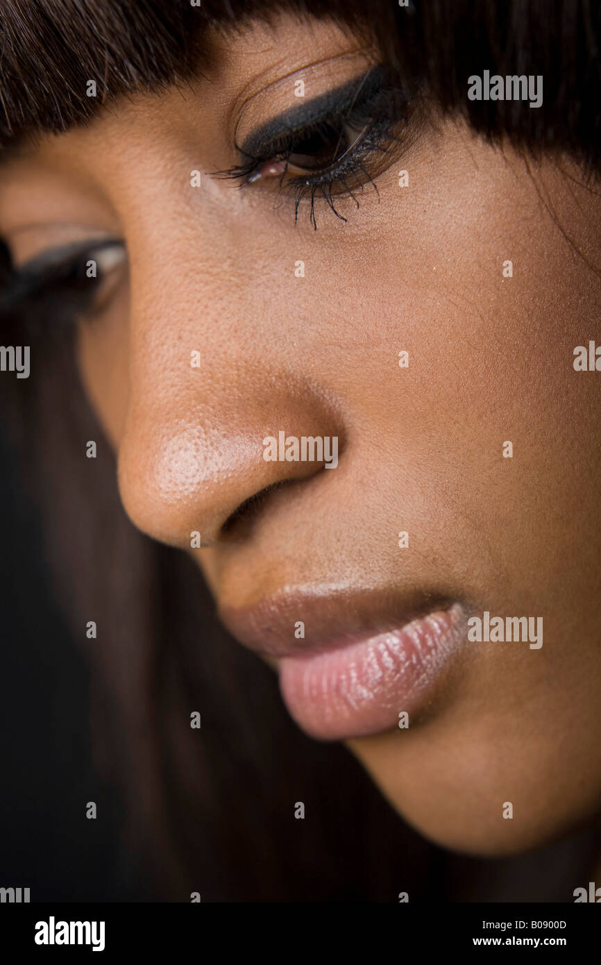 Close-up of a young dark-skinned woman's face Stock Photo - Alamy