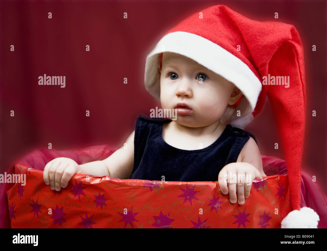 Baby with Santa hat Stock Photo - Alamy