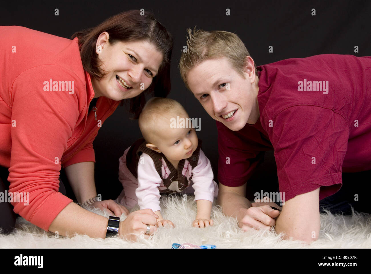 family portrait, parents with baby Stock Photo - Alamy