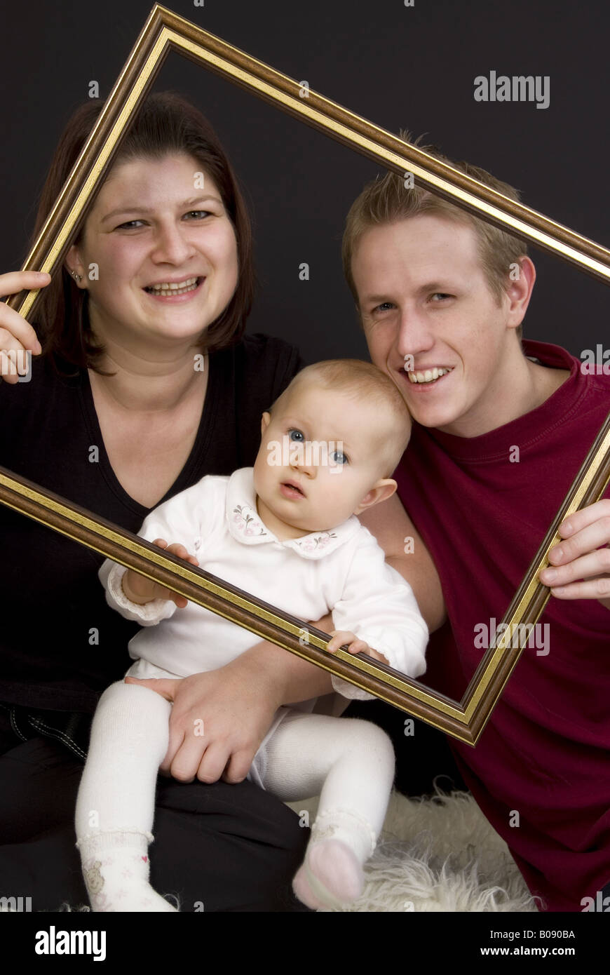 Family portraits frame hi-res stock photography and images - Alamy