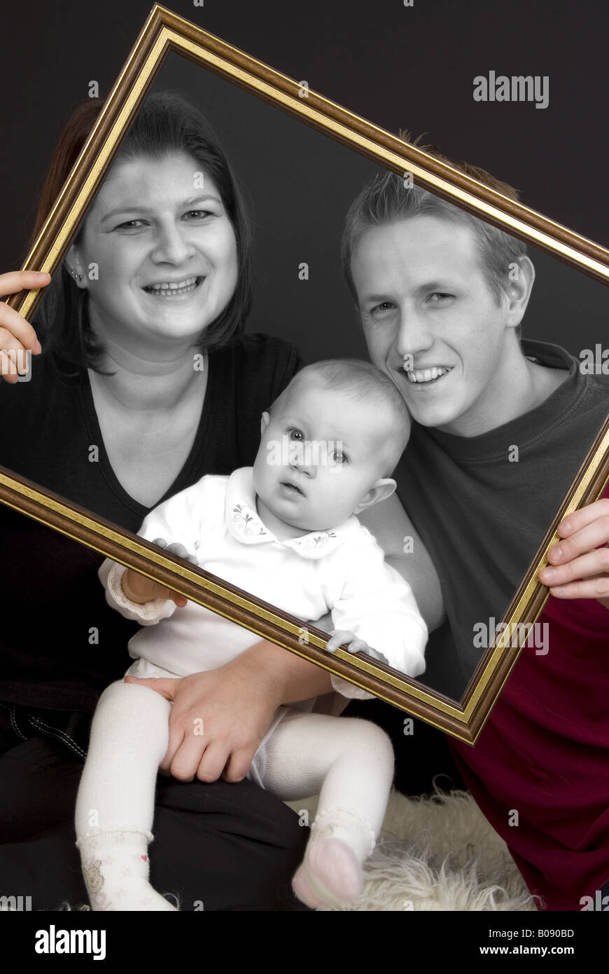 Happy family picture frames hi-res stock photography and images - Alamy
