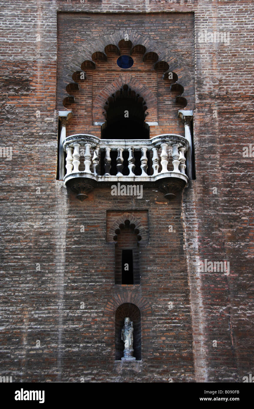 Window with balcony on the exterior facade of the Seville Cathedral ...