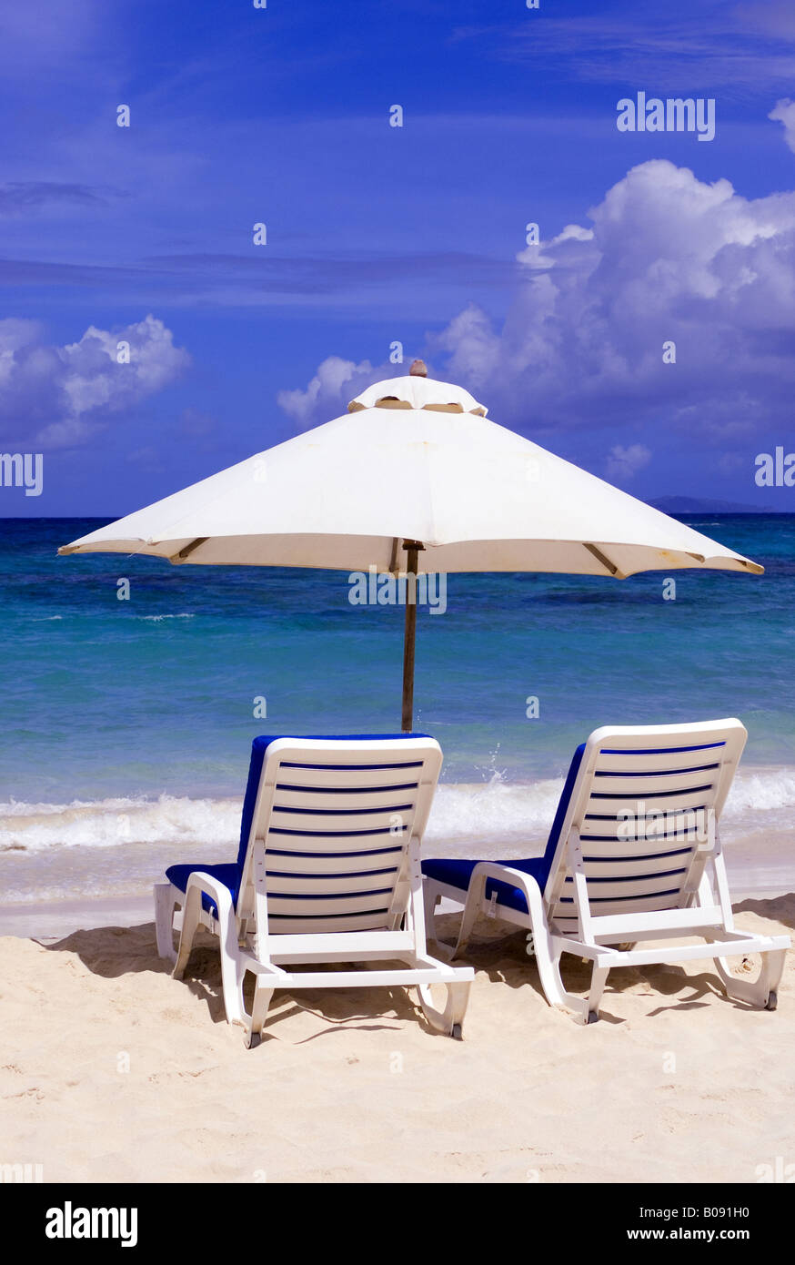 two canvas chairs and one sun shade, Samoa, Caribbean Sea Stock Photo ...