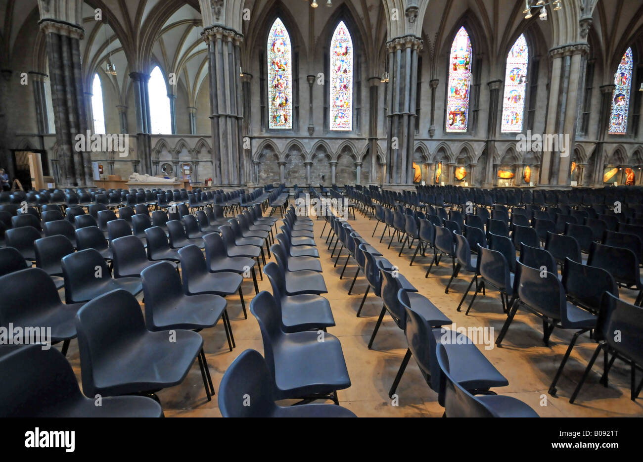 rows of empty plastic chairs inside Lincoln Cathedral Lincolnshire ...