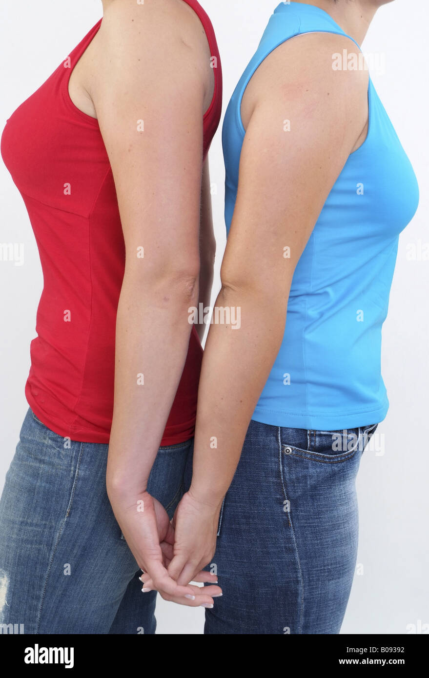 two women hand in hand, friendship Stock Photo - Alamy