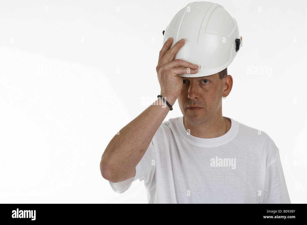 Taking takes take off remove removes helmet hi-res stock photography ...