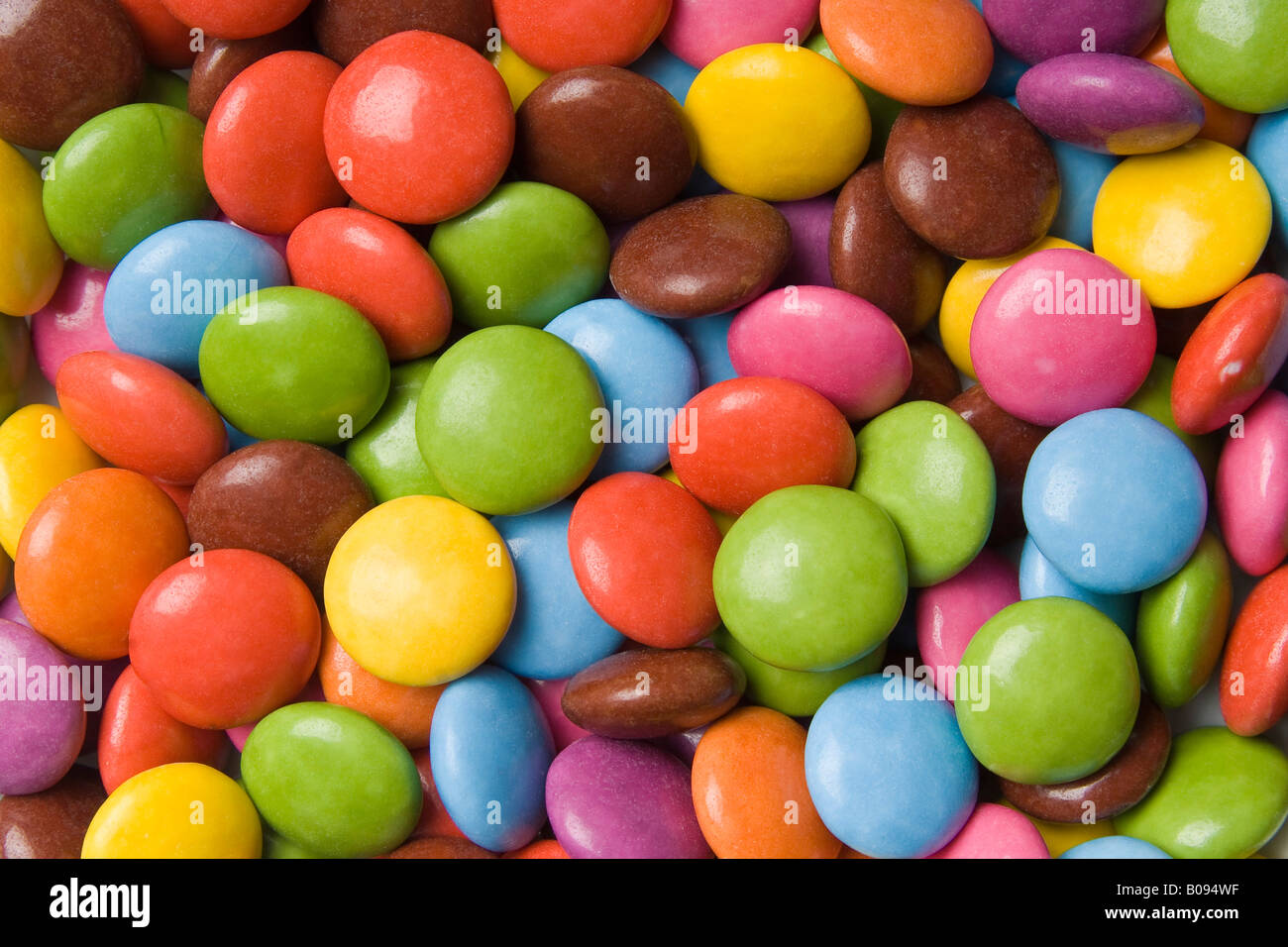 Colourful candy-coated, sugar-coated chocolates Stock Photo - Alamy