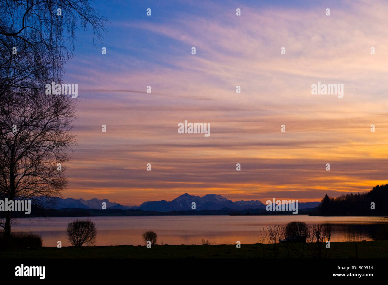 Lake Wallersee near Salzburg at dusk with a view of the Loferer ...