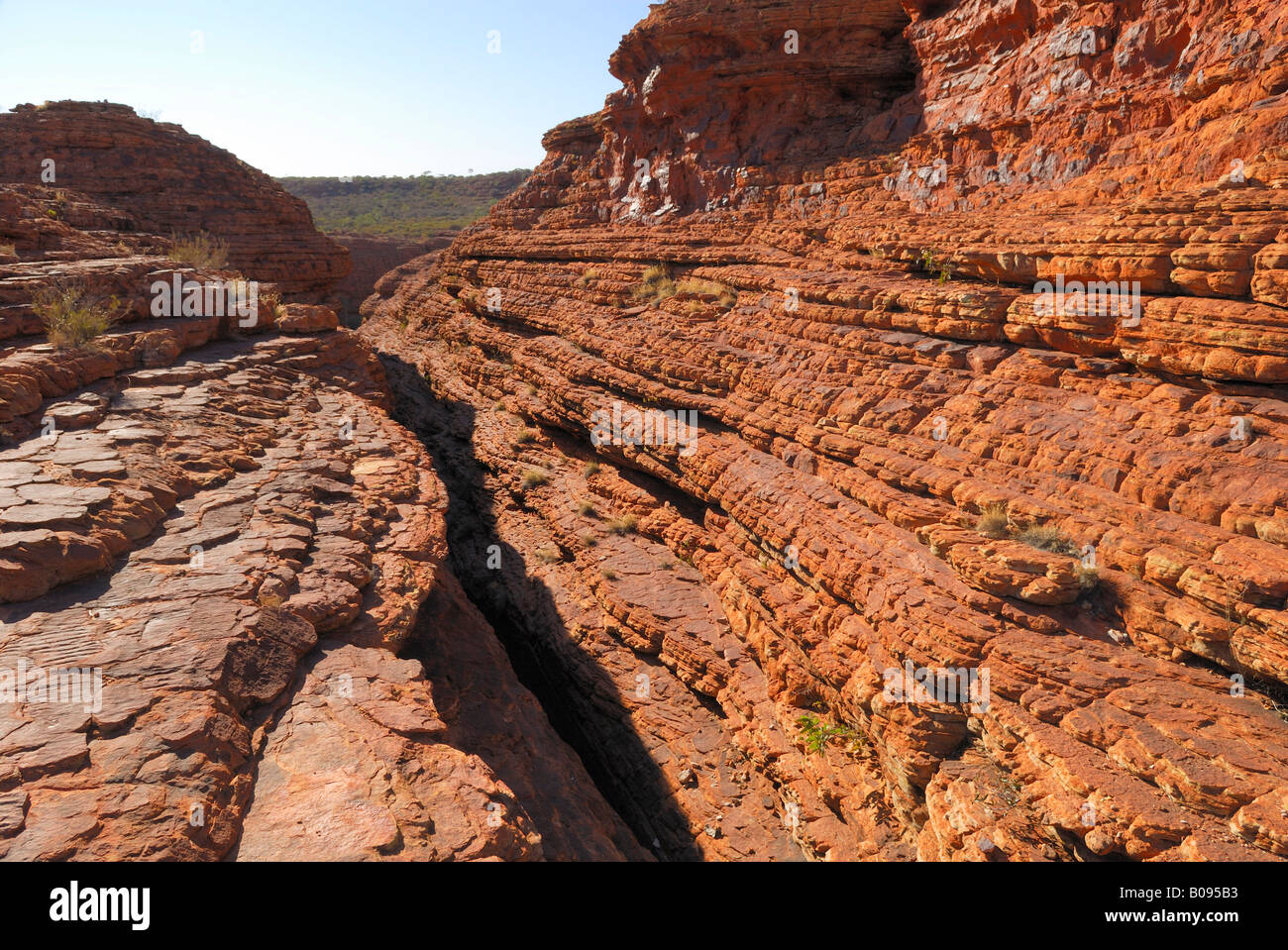 Fault or crack through stratified layers of red rock at the Kings ...