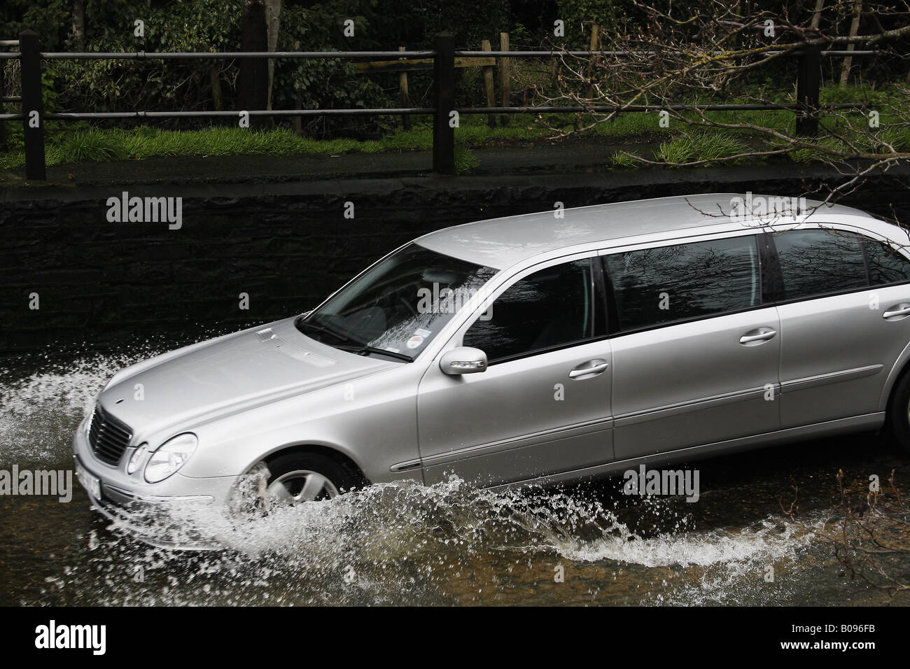 car driving through ford Stock Photo - Alamy