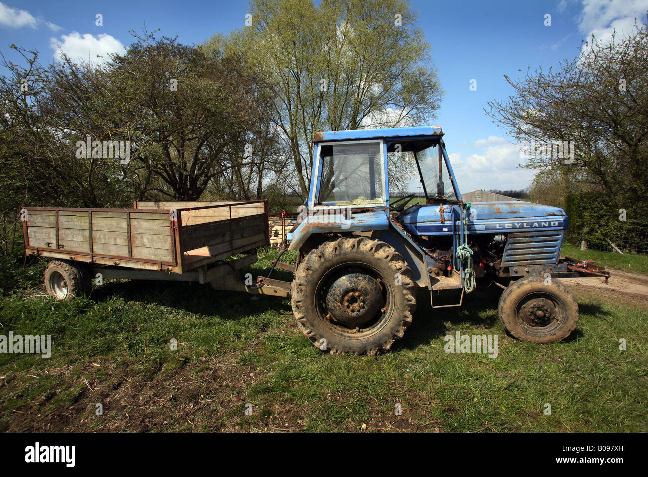Old British Leyland Tractor and trailer on a farm in Steeple Bumpstead ...