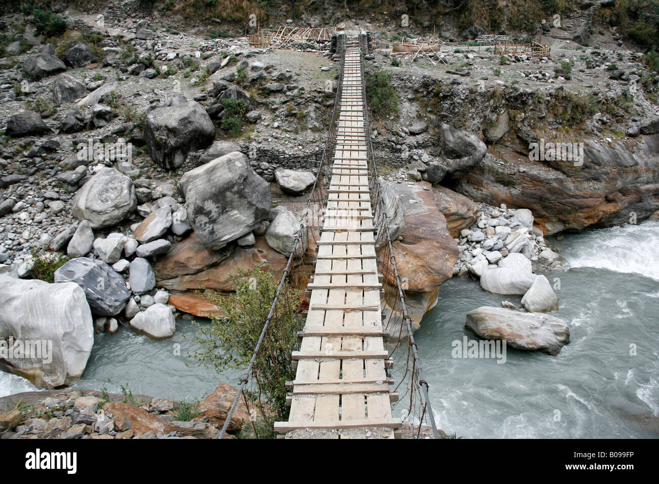 Wooden suspension bridge annapurna nepal Stock Photo - Alamy