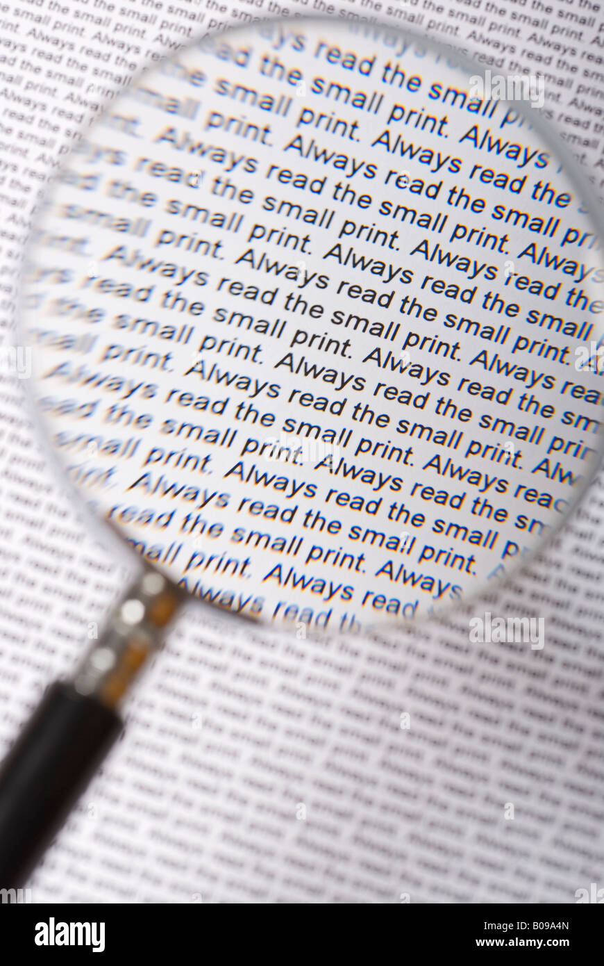 Stock photo showing a magnifying glass over a sheet of paper Stock ...