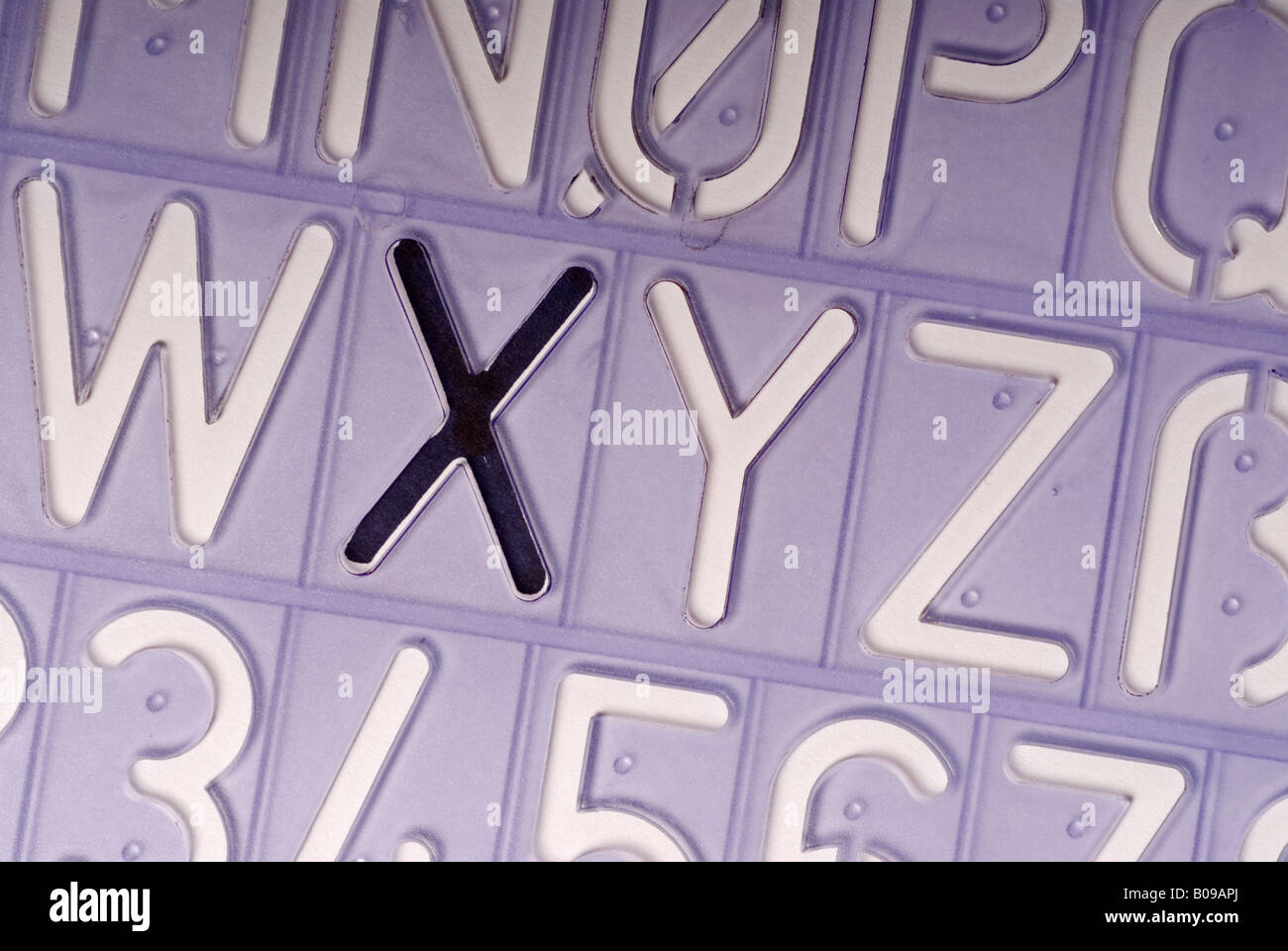 Stock photo of a stencil with the X highlighted in black X marks the ...