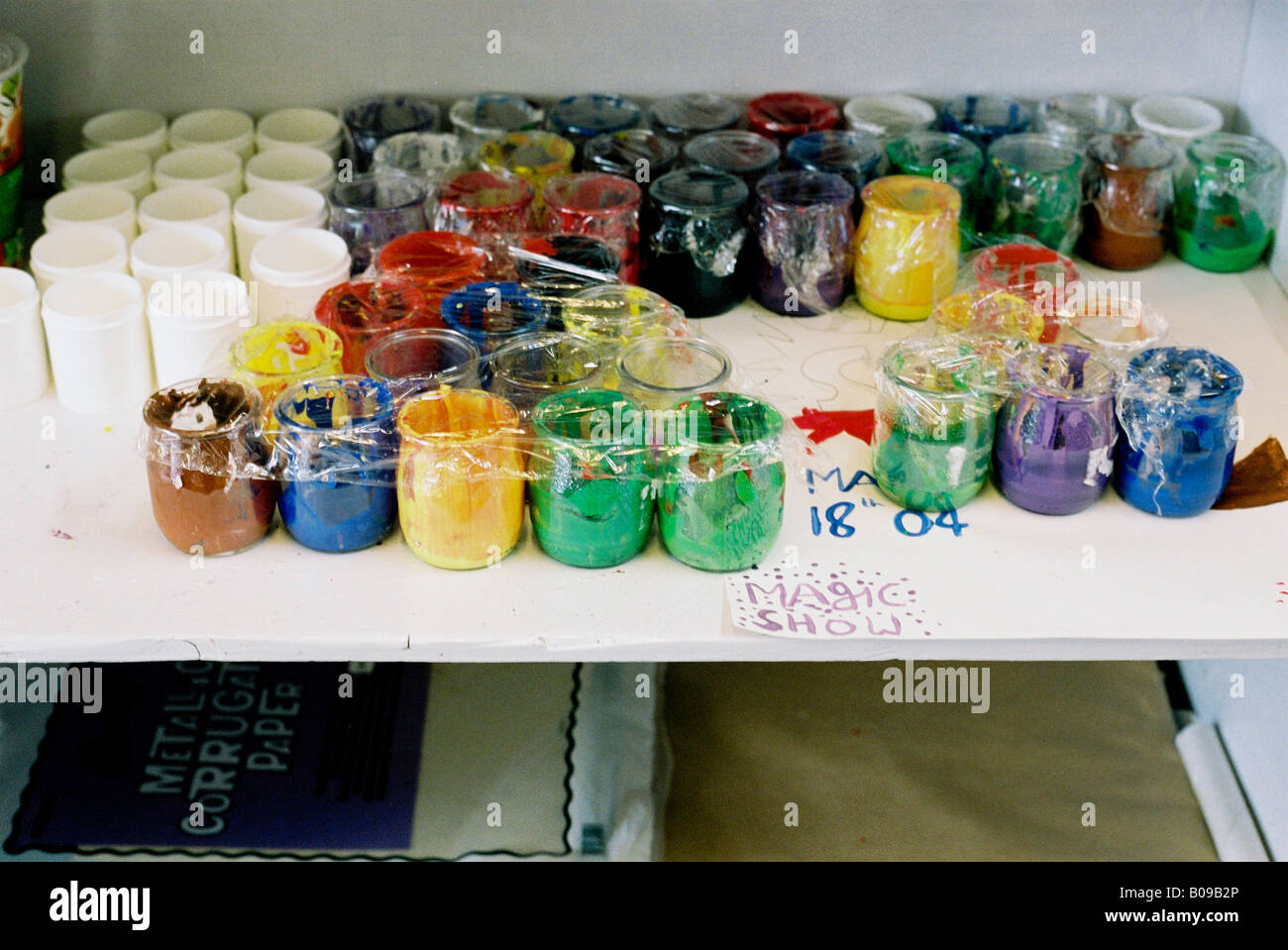 school paint pots Stock Photo - Alamy