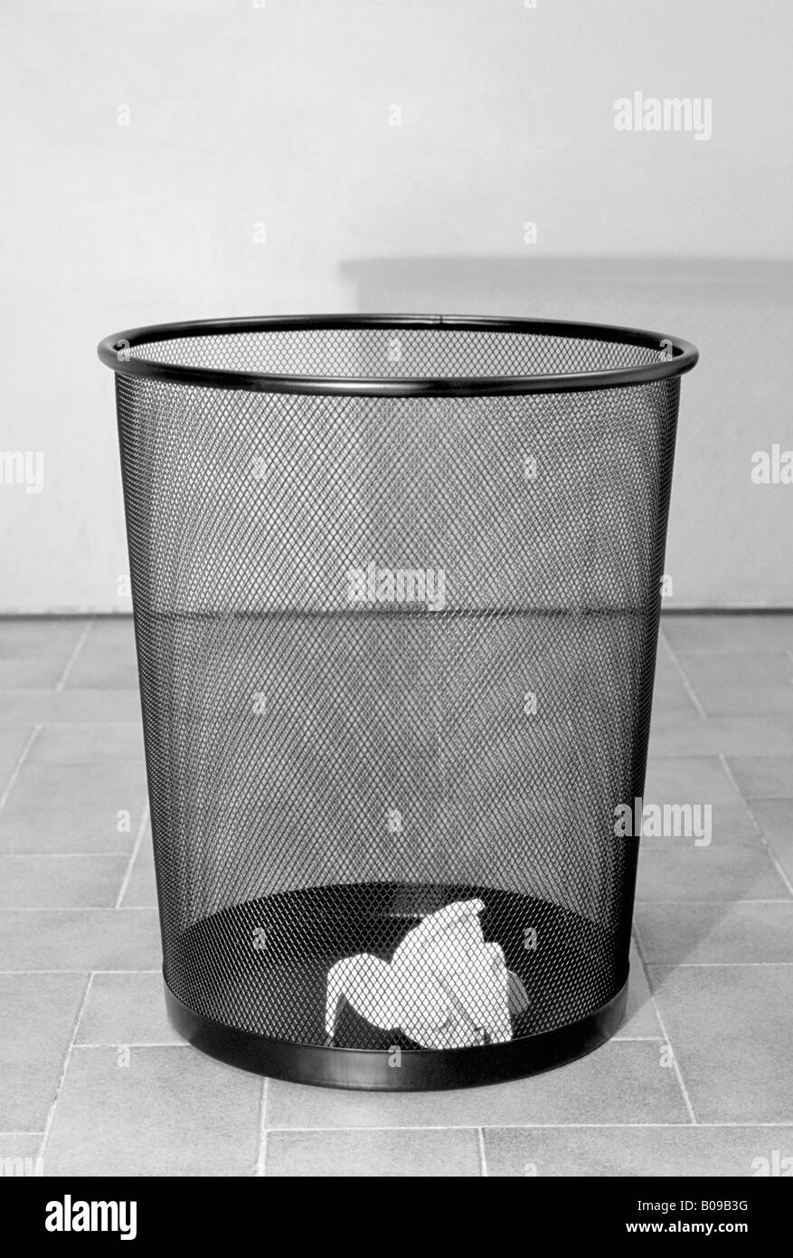 Waste paper basket Black and White Stock Photos & Images - Alamy