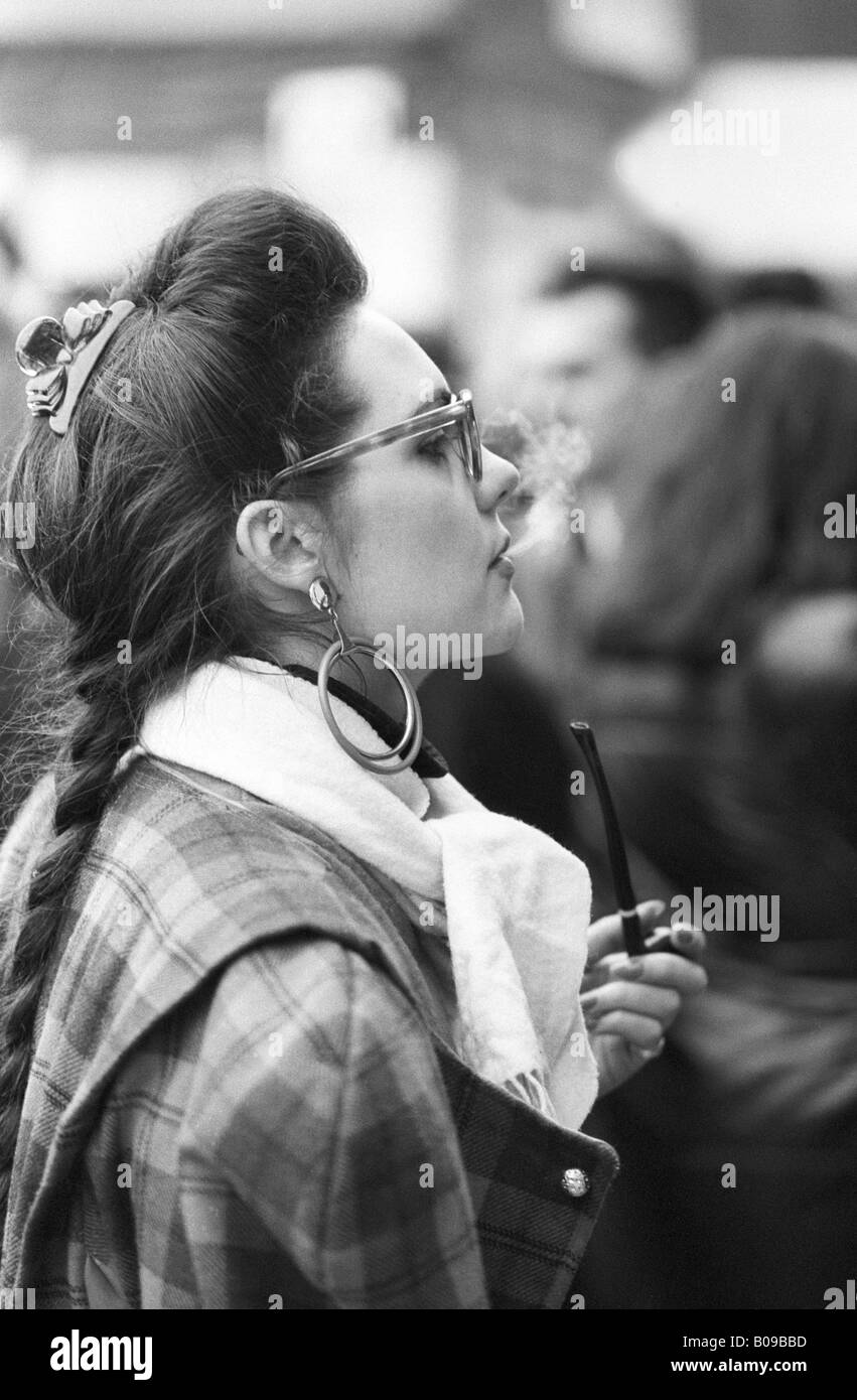 Lady smoking pipe in Paris, France 1988 during Fashion week. 1980s ...