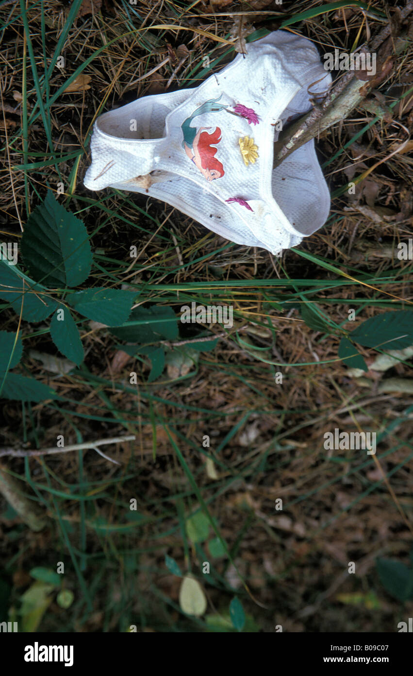 pair of young girls or toddlers discarded underwear in bushes Stock ...