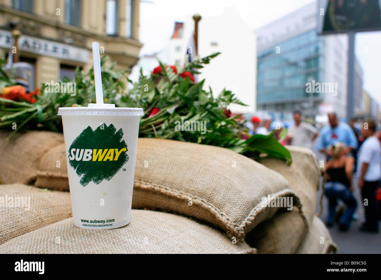 Subway cup on sand sacks at the Checkpoint Charlie, Berlin, Germany ...