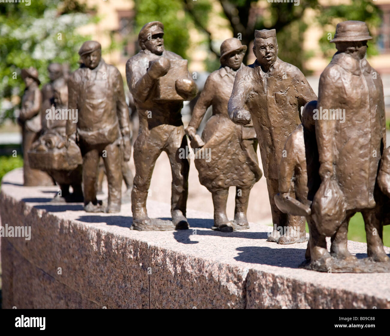 Miniature bronze statues of people , Finland Stock Photo - Alamy