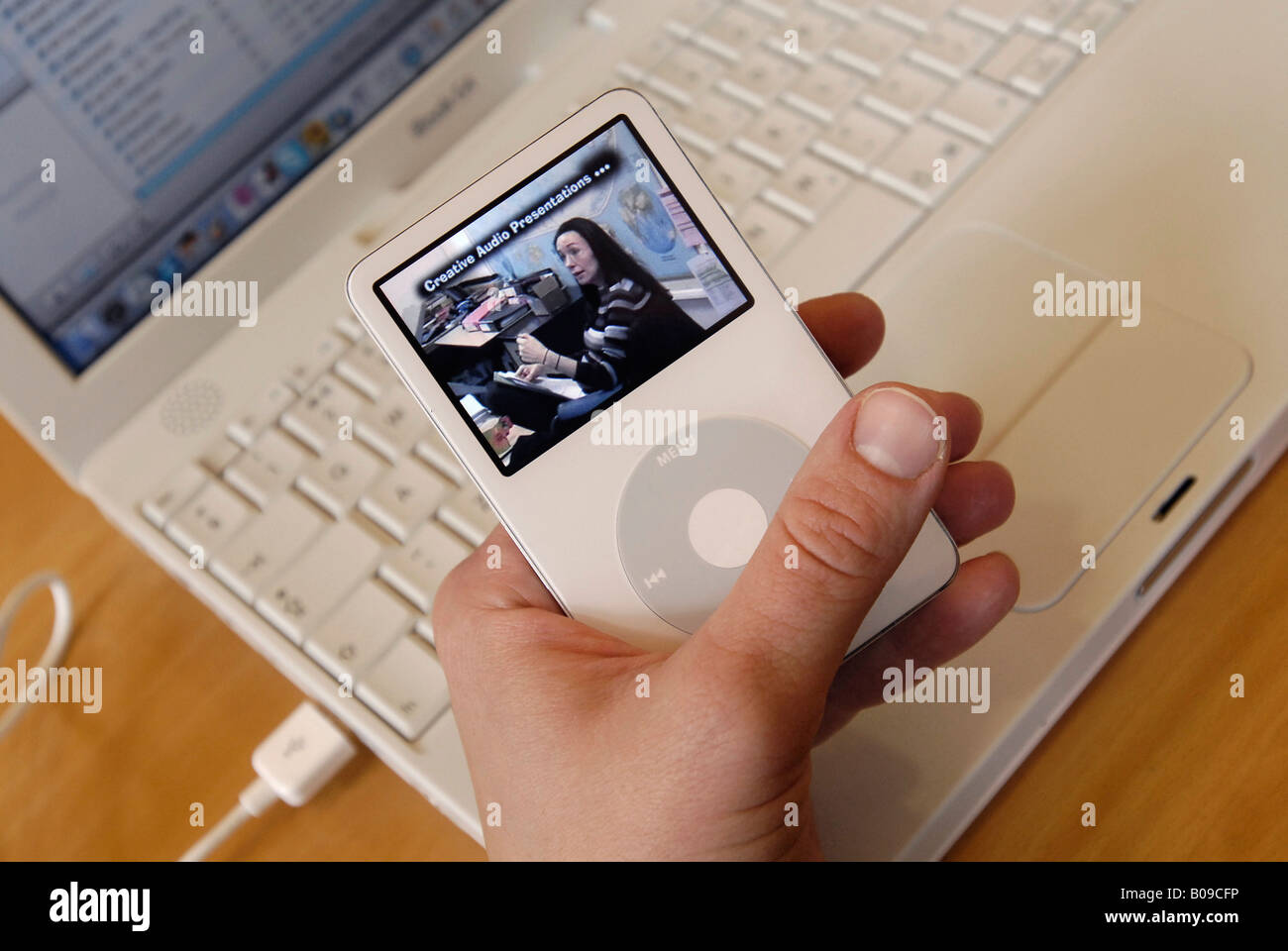 Hand holding ipod hi-res stock photography and images - Alamy