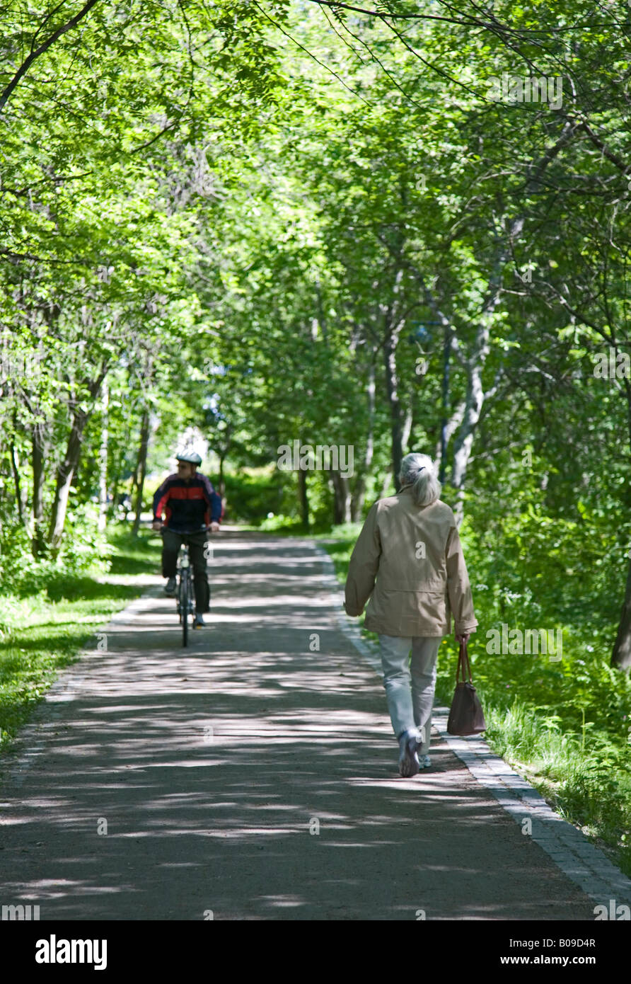 Two people walking towards each other hi-res stock photography and ...