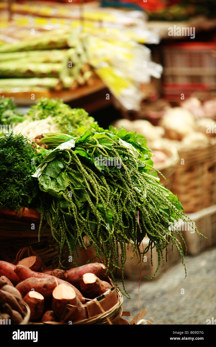 Market good long beans and roots vegetables Stock Photo - Alamy
