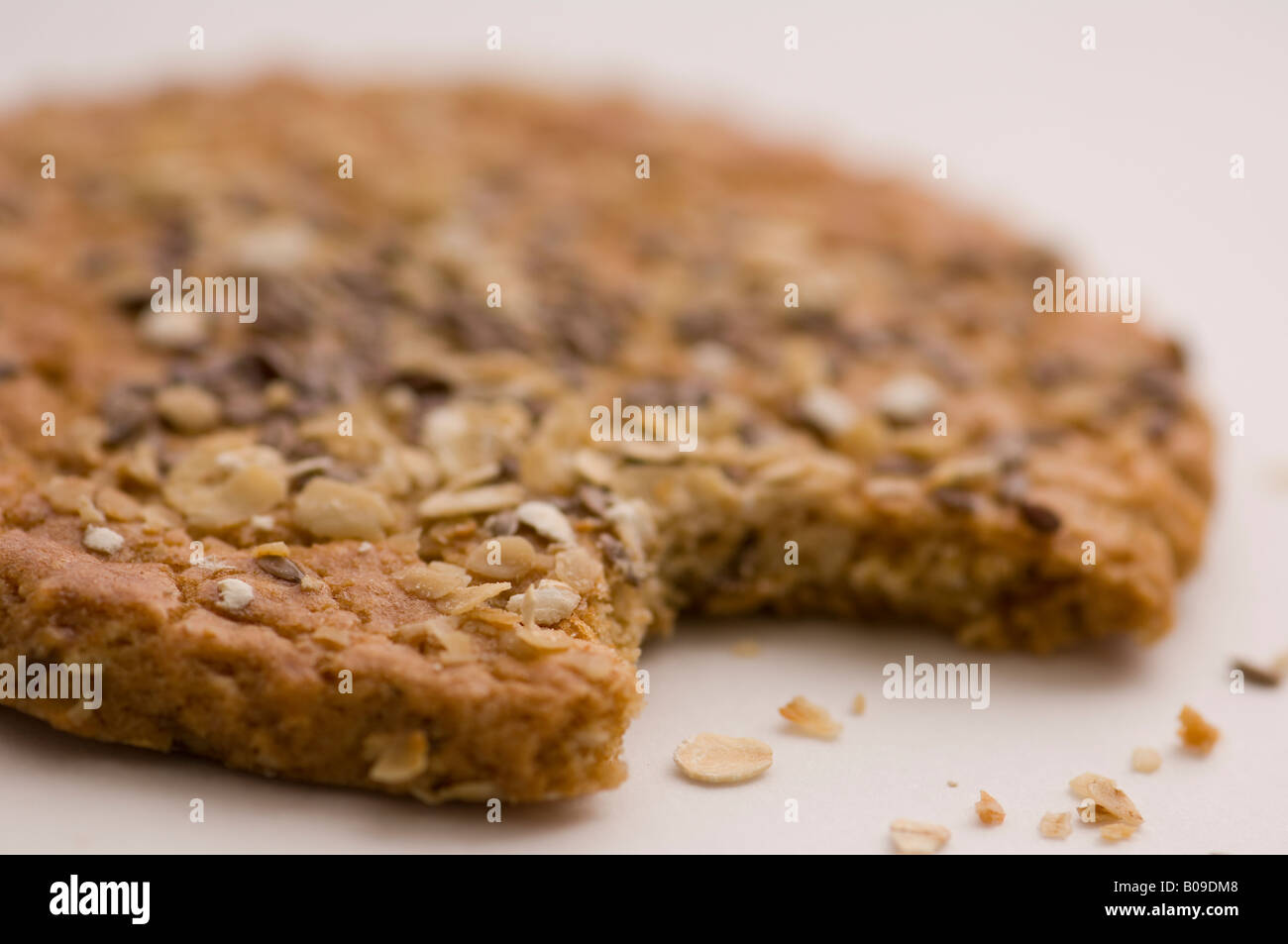 A cookie with a bite taken out of it Stock Photo - Alamy