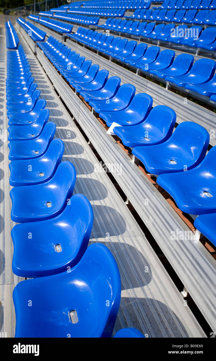 Blue plastic seats at Finnish football stand , Finland Stock Photo - Alamy