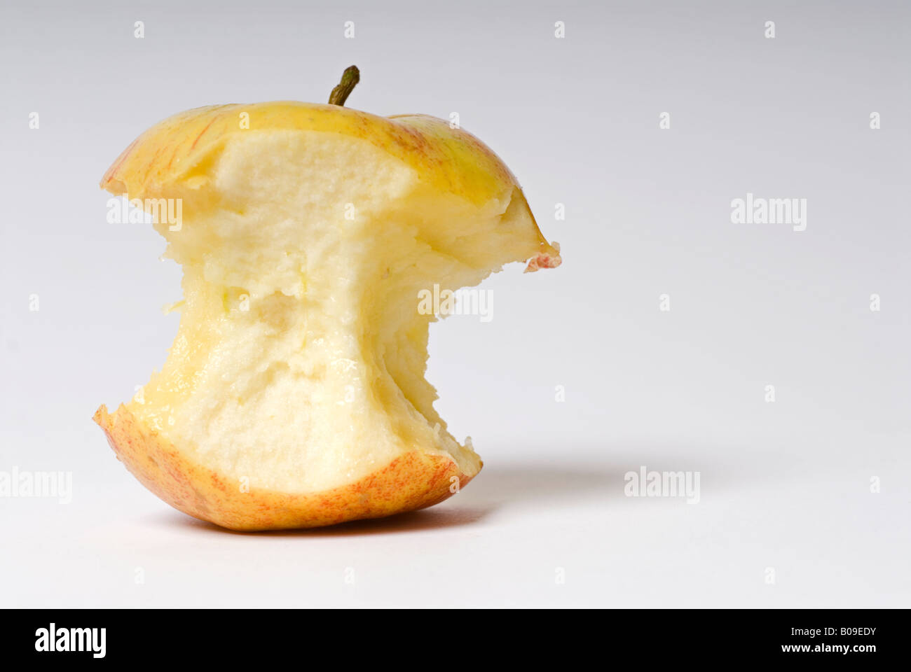 Stock photo of a fresh apple core on a white background Stock Photo - Alamy