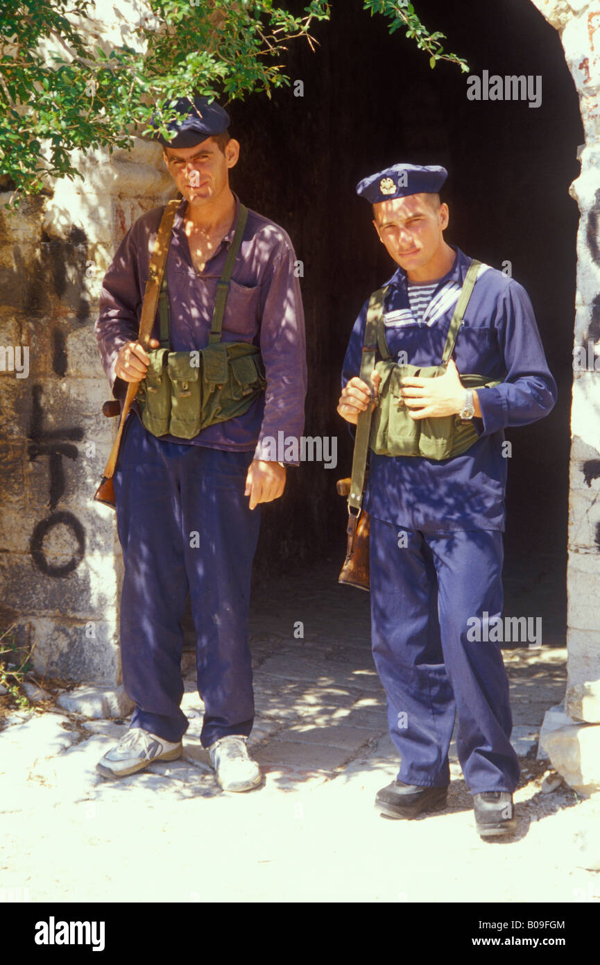 Two guards in Albania Stock Photo - Alamy