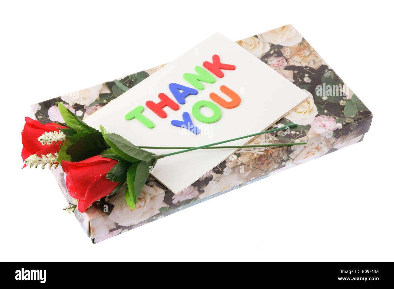 Red Roses and Greeting Card on Gift Box Stock Photo - Alamy