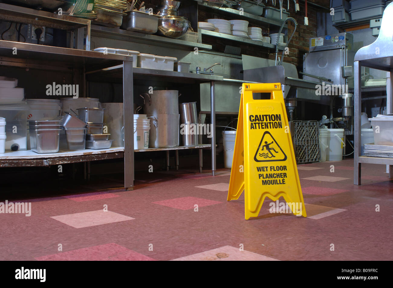 Caution sign in a kitchen Stock Photo - Alamy