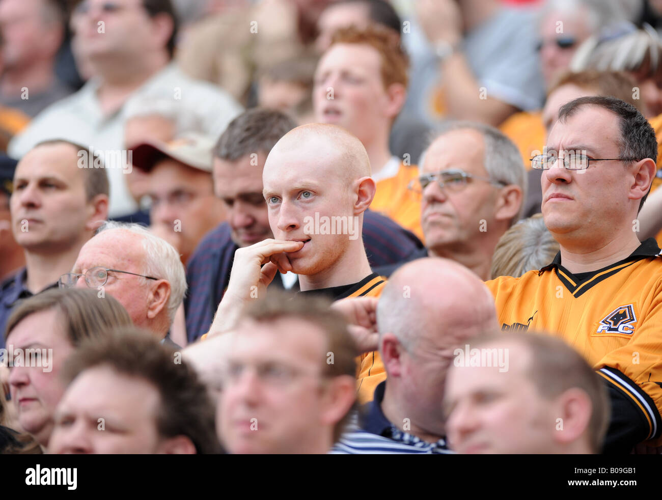 Nail biting football fan Wolverhampton England Uk Stock Photo - Alamy