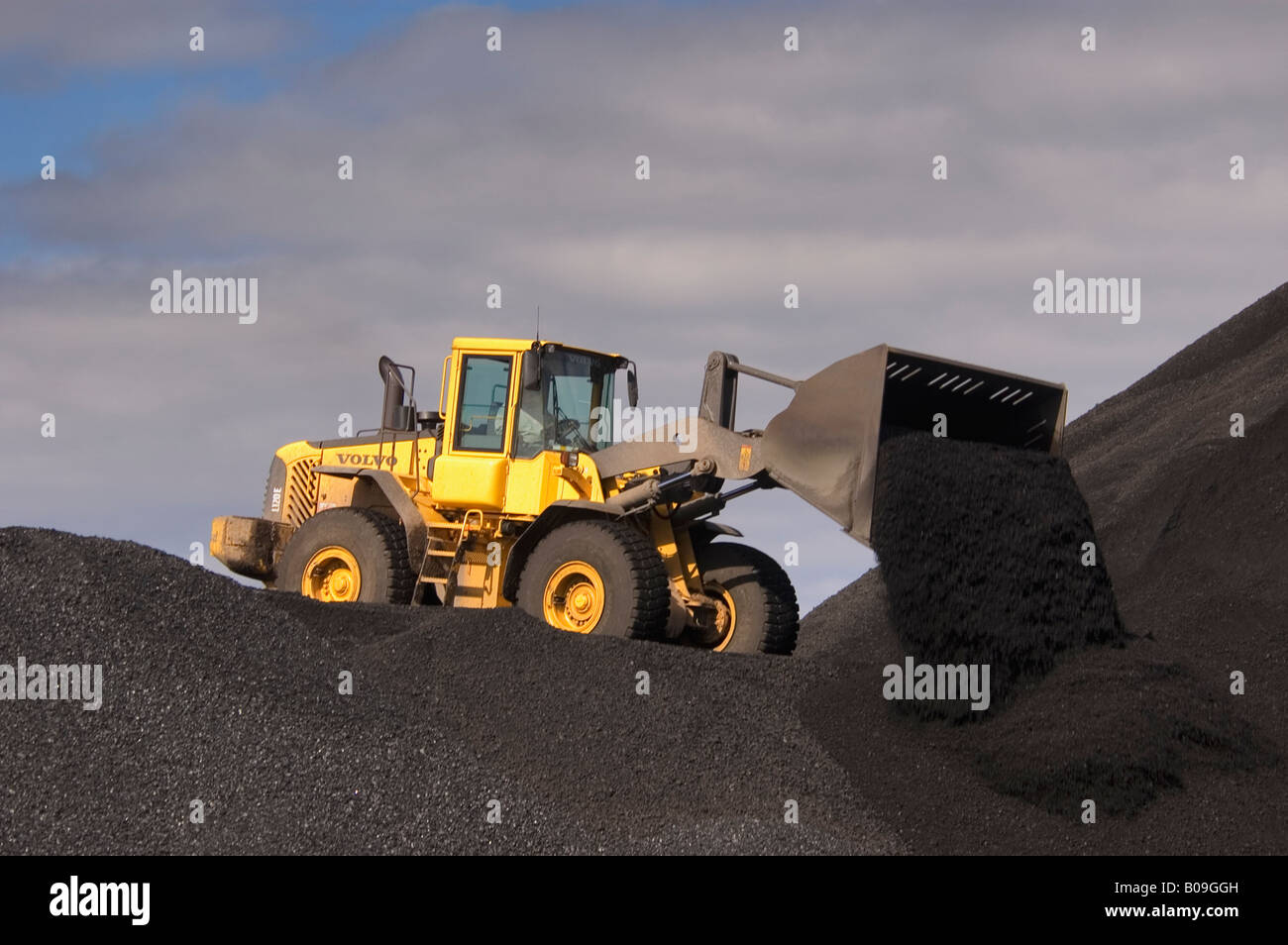 Bulldozer Belching Black Exhaust While Moving Coal At Power Plant ...