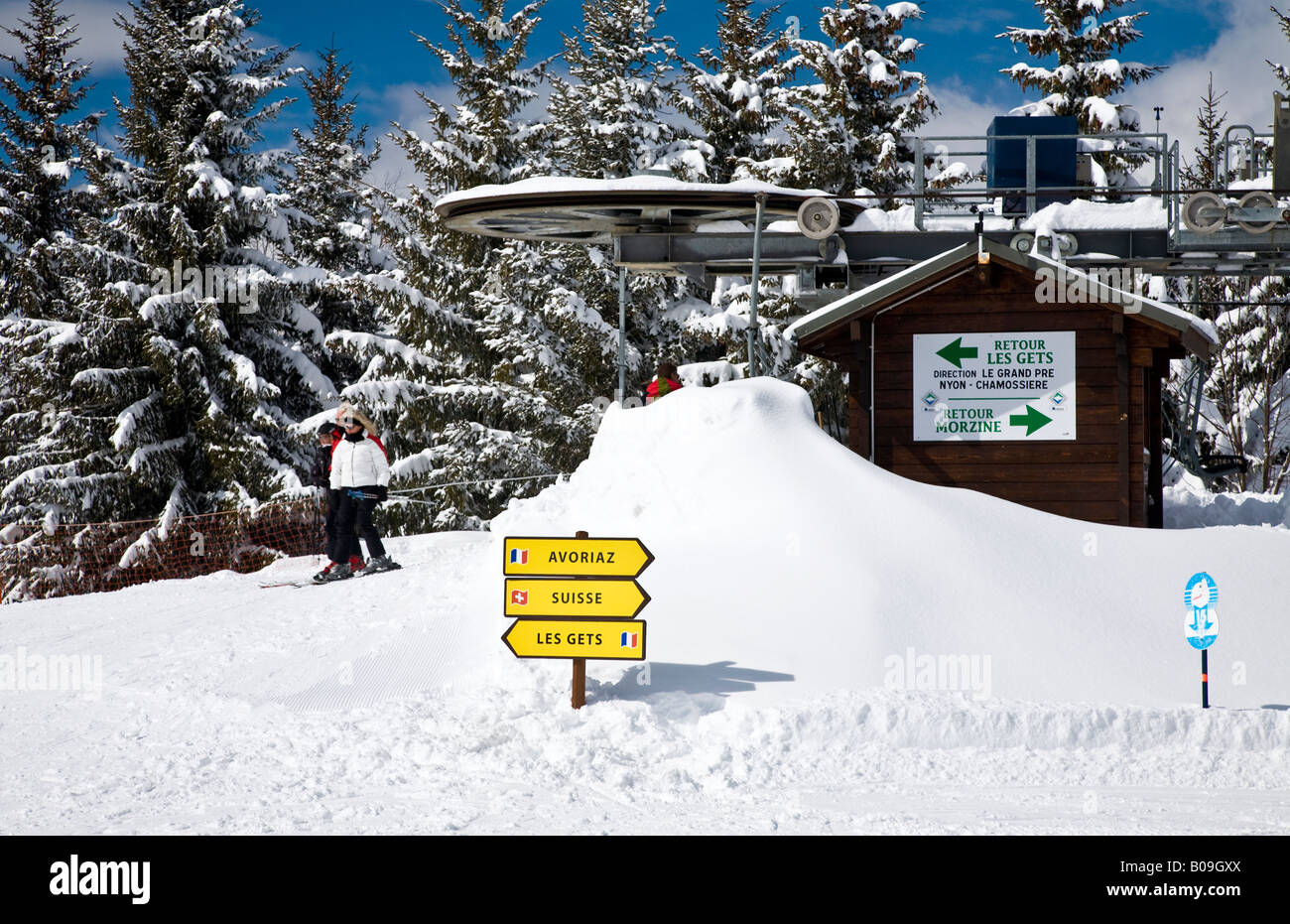 Ski lift terminal at Le Pleney, with signs for Avoriaz and Les Gets ...