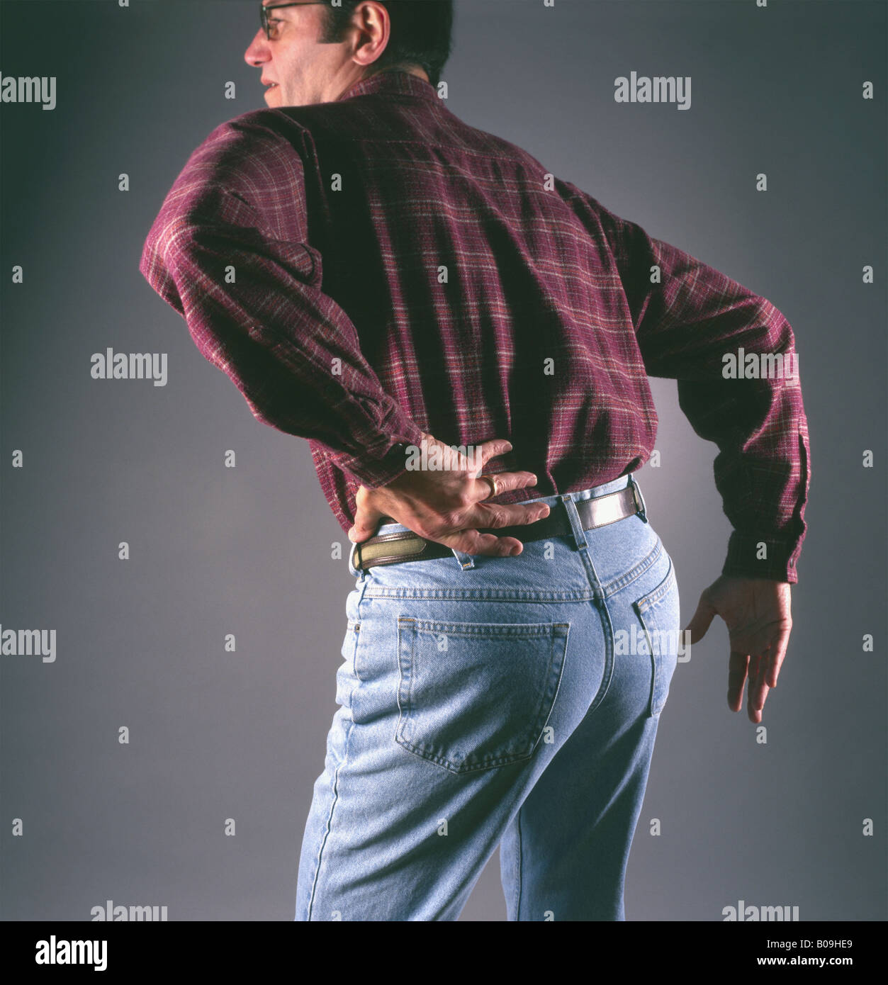 man with back pain Stock Photo - Alamy