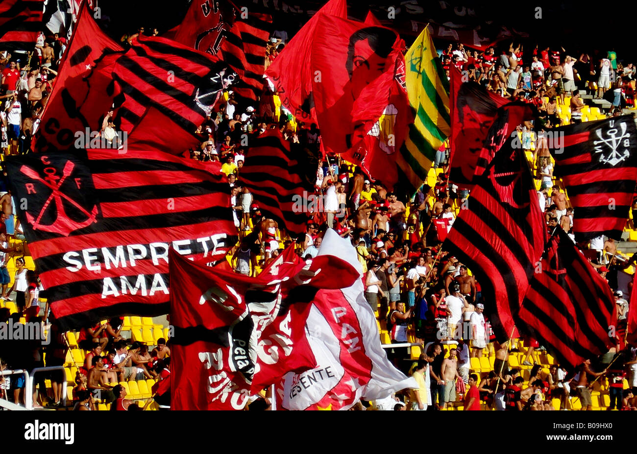 Flamengo supporters waving their time flags at Maracana' Stadium.Rio de ...