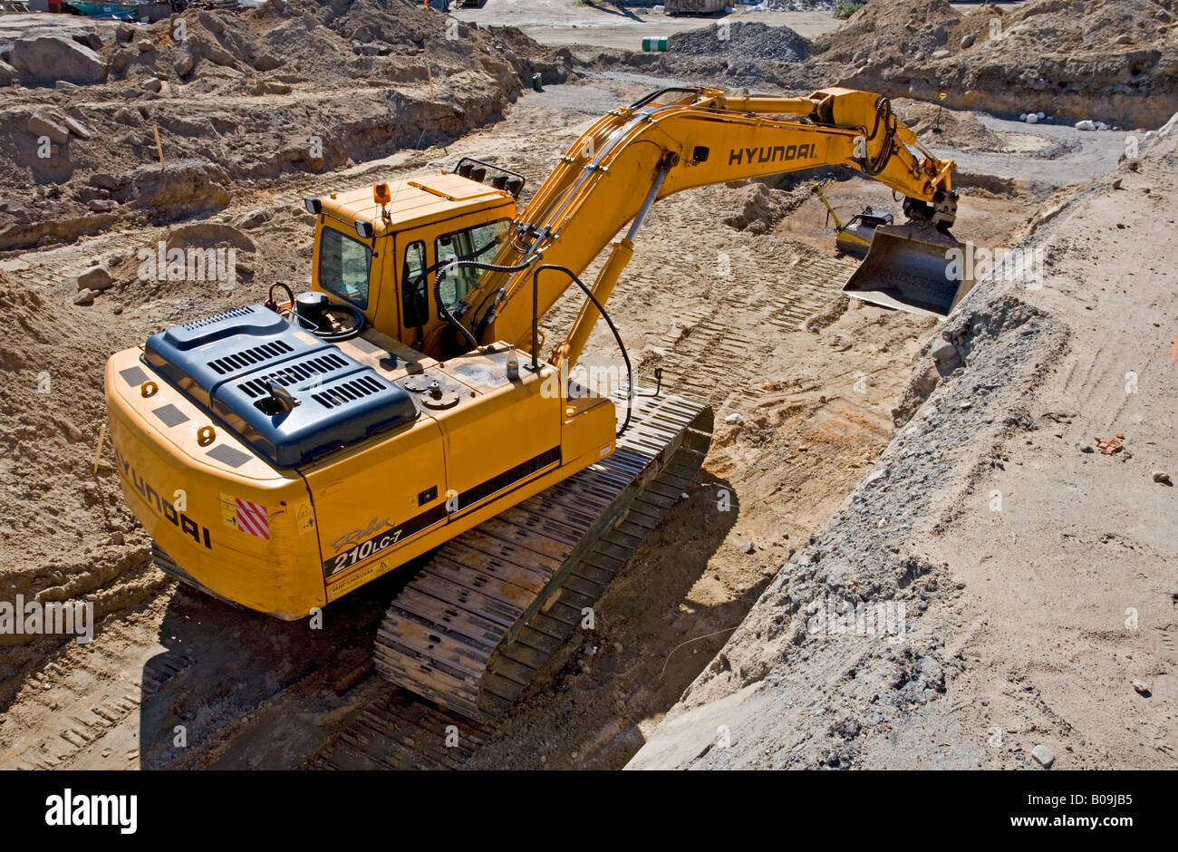 Yellow Hyundai digger at the bottom of a ditch , Finland Stock Photo ...