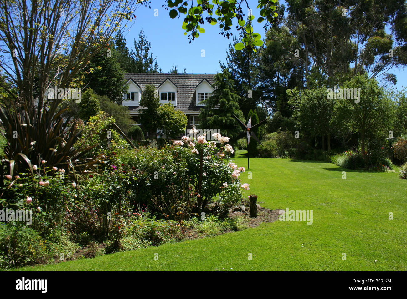Beautiful home and garden on a sunny day Stock Photo - Alamy