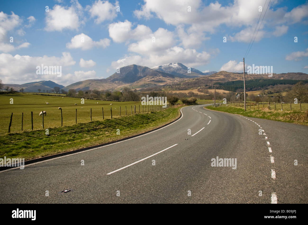 The A470 road and Cadair Idris mountain capped with snow Snowdonia ...