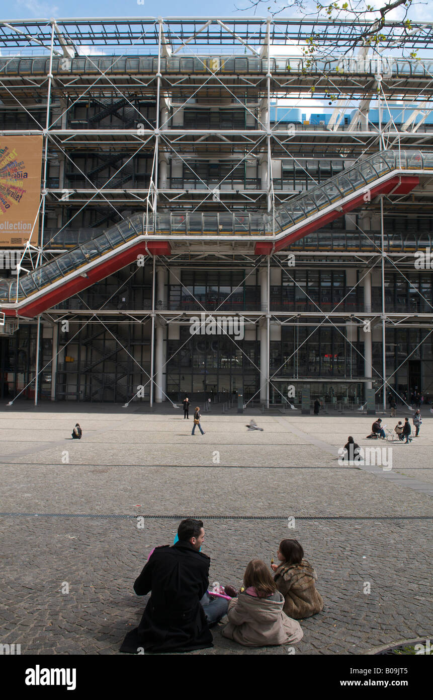 Family sitting before Centre Georges Pompidou in Paris Stock Photo - Alamy